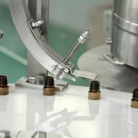 China Automatic Multi-Head Filling Valve Head Essential Oil Spray Bottle Dropper Bottle Capping Machine for sale