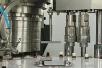China Automatic Multi-Head Filling Valve Head Essential Oil Spray Bottle Dropper Bottle Capping Machine for sale