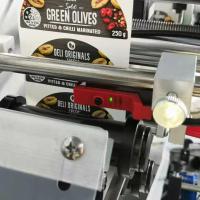 China Automatic Carton Labeling Applicator With Electric Driven Plane Labeling Machine for sale