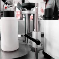 China Npack Automatic Pet Lube Oil Jerry Can Front and Back Labeling Machine with Coding Machine for sale