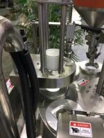 China Automatic Rotary Tomato Chilli Sauce Cup Filling And Sealing Machine for sale