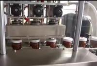 China Automatic PLC Control Metal Tin Cap Sealing Machine with Stainless Steel 304 Construction and 2200-2400 BPH Capacity for sale