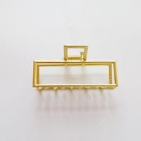China Large Gold Alloy Hair Claw Clip 9cm Hollow Shark Design Simple Elegant Women Accessories for sale