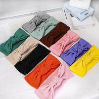 China Pure Color Knitted Bow Hair Band for Women 11cm Wide Elastic Non Slip Winter for sale