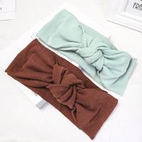 China Pure Color Knitted Bow Hair Band for Women 11cm Wide Elastic Non Slip Winter for sale