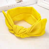 China Pure Color Knitted Bow Hair Band for Women 11cm Wide Elastic Non Slip Winter for sale