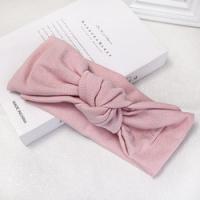 China Pure Color Knitted Bow Hair Band for Women 11cm Wide Elastic Non Slip Winter for sale