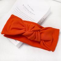 China Pure Color Knitted Bow Hair Band for Women 11cm Wide Elastic Non Slip Winter for sale