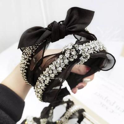 China Shiny Diamond Pearl Bow Hair Band 7cm Wide Elastic Memory Plastic Women Hair Accessories for sale