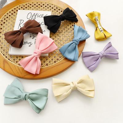 China Wholesale Bowknot Hair Spring Clip 14cm Alloy Metal Hairpin for Women Girls Cute Bangs for sale