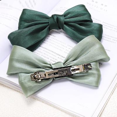 China Korean College Style Bow Spring Hair Clip 18cm Alloy Cloth Decorative Hairpin for Women Thin Hair for sale
