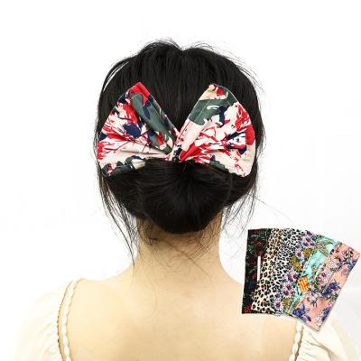 China Adjustable Non Slip Hair Bun Maker 33x10cm Soft Fabric Magic Hair Curler for Women for sale