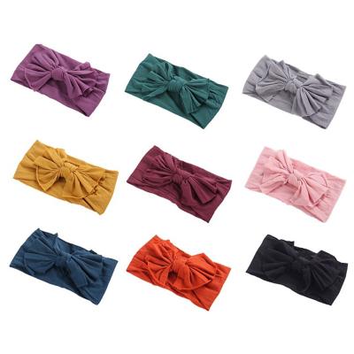 China Soft Nylon Wide Edge Knot Bow Headband for Baby Girls Kids 18cm Diameter for sale