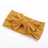 China Soft Nylon Wide Edge Knot Bow Headband for Baby Girls Kids 18cm Diameter for sale