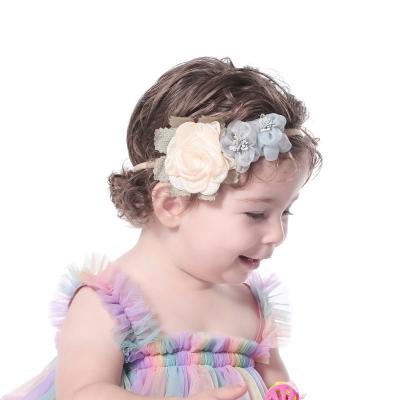 China Elastic Baby Girl Headband Adjustable Nylon Turban 14x10cm Soft Stretchy Infant Hair Band for sale
