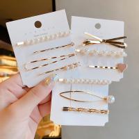China Women's 4 Piece Pearl Alloy Hair Clip Set Elegant Bangs Side Clip 10cm 30g for sale