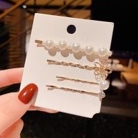 China Women's 4 Piece Pearl Alloy Hair Clip Set Elegant Bangs Side Clip 10cm 30g for sale