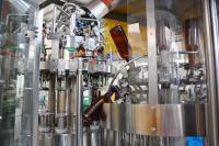 China Glass Bottle Alcohol 3000BPH Carbonated Drink Filling Machine for sale
