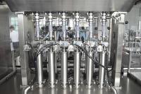 China 3 In 1 Rotary 500ml Bottle Filling Capping Machine for sale
