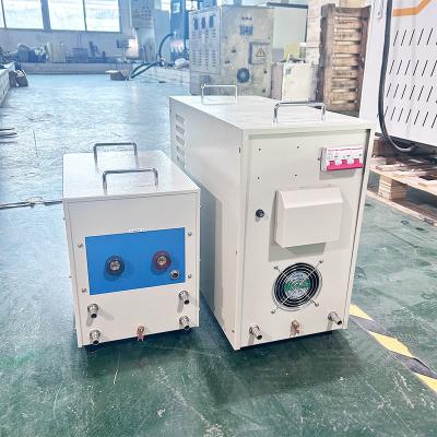 China High Quality 25kw Portable Induction Heater Machine for Metal Heat Treatment 220v with New Engines Pumps Motors for sale
