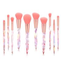 China Wood Handle 11 Pieces Diamond Sparkle Makeup Brush Set Nylon Hair With Bag for sale