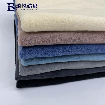 China in stock lot super soft  94 polyester 6 spandex tricot anti pilling polar fleece fabric for garment for sale