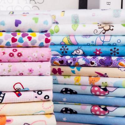 China 100% Cotton Face Printed Coral Fleece Fabric Pajama Toys Plush Toy Fabric Shrink-Resistant Double Flannel Fabric Skin-Friendly for sale