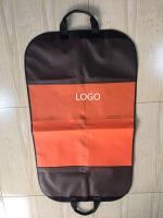 China Handle Suit Garment Bag Travel Colored Non Woven Printed With Clips 115*60 cm Size for sale