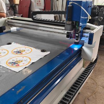 China High Precision CNC Control Automatic Edge Cutting Machine with Optical Positioning for Melamine Decal Paper for sale
