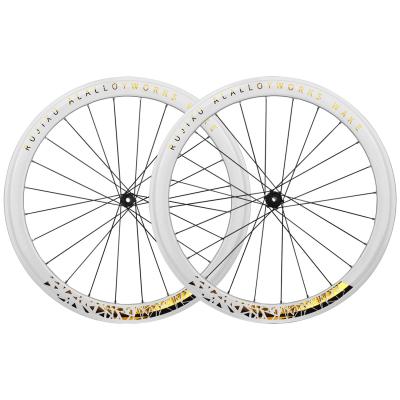 China RUJIXU 36T Ratchet 700C Carbon Clincher Wheelset - 50mm Frame Height, 2215g Weight, Disc Brake Compatible for sale