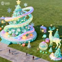 China Custom Giant Spiral Slide Christmas Tree Silk Lantern Set, Outdoor LED Light Sculpture Group for Theme Park Christmas Light Festival for sale