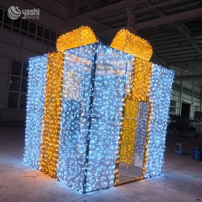 China Custom Walk-through Gift Box LED Motif Light, Giant Lighted Gift Box Tunnel Sculpture for Shopping Mall Christmas Decor for sale
