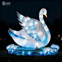 China Custom Large White‑Blue Swan Zigong Lantern, LED Water Bird Light Sculpture with Wave Base for Outdoor Night Festival for sale