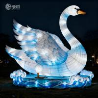 China Custom Large White‑Blue Swan Zigong Lantern, LED Water Bird Light Sculpture with Wave Base for Outdoor Night Festival for sale