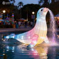 China Custom Sea Lion Lantern, Large Floating LED Sea Lion Light Sculpture With Wave Base for Ocean‑Theme Park & Water Light Festival for sale