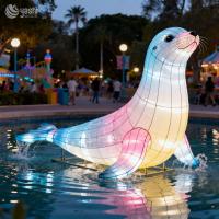 China Custom Sea Lion Lantern, Large Floating LED Sea Lion Light Sculpture With Wave Base for Ocean‑Theme Park & Water Light Festival for sale