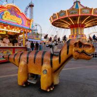 China Customizable Electric Ride-On Dinosaur Car for Carnival & Theme Parks Interactive Game Facility, Colors Customizable for sale