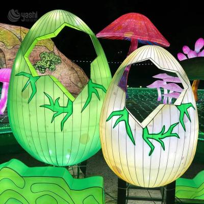 China Custom Dinosaur Hatching Egg Lantern Set, Large‑Size LED Dino Egg Light Sculpture for Theme Park for sale