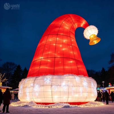 China Custom Giant LED Santa Hat Light Sculpture, Outdoor Fabric Frame Christmas Santa Hat Light Display with Bell for Light Festival, Support Customization for sale