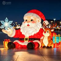 China Custom Giant Outdoor Santa Claus Head Festival Lantern With Christmas Tree Gift Box for Theme Park Night Tour & Holiday Party Decoration for sale