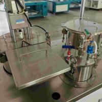 China 5 to 1 Black Epoxy Glue Potting Machine Offering Glue Dispensing and Potting Solutions for Water Pump Production Lines for sale