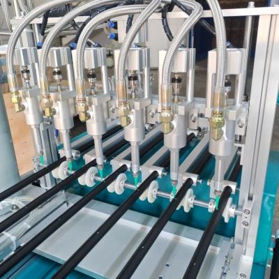 China Glue Dispensing Machine designed for automatic silicone dispensing on pcb strips with glue application and performance for sale