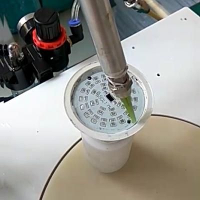 China Round Glue Dispensing Machine Four Stations Glue Dispensers For A60 A80 Bulb Diffuser for sale