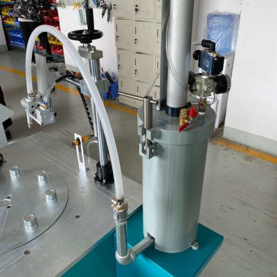 China Glue Dispensing Machine for Silicone Glue Application on Round UFO Lights and Disc Lights in Production Environment for sale