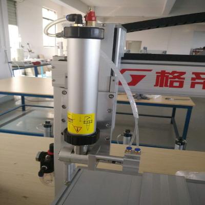 China Small Glue Dispensing Equipment 0.4Mpa - 0.6Mpa Glue Robot For Kitchen Cooktop Frame for sale
