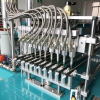 China Glue Dispensing Robot designed for silicone glue application on 2X2 backlit panel lights with independent control of 8 dispensing heads for sale