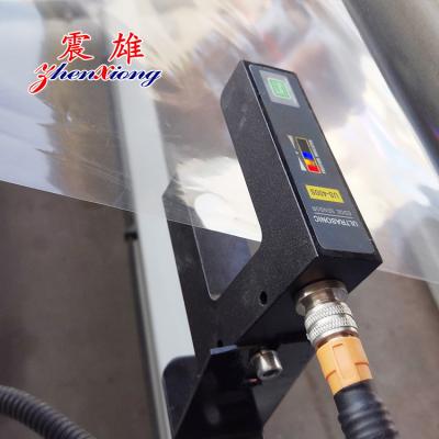 China High Precision Automatic Film Punching Machine with PLC Control System for Wide Applicability for sale