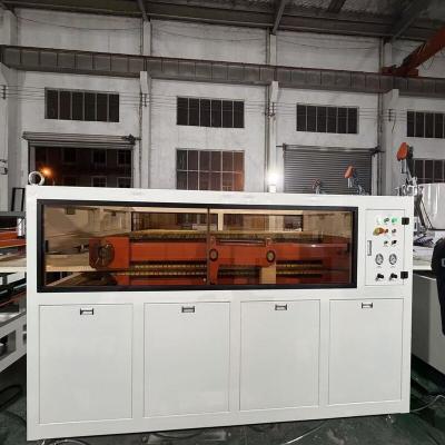 China PVC Automatic  WPC Door Production Line Wall Panel Cross Cutting Machine for sale