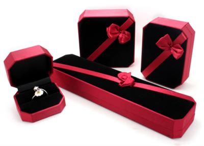 China Custom Red PU Leather Jewelry Box with Ribbon Eco-Friendly Gift Packaging 200gsm for sale