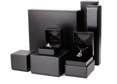 China Custom Logo Empty Small Leather Jewelry Box with Full Color Offset Printing 100x100x50mm for sale